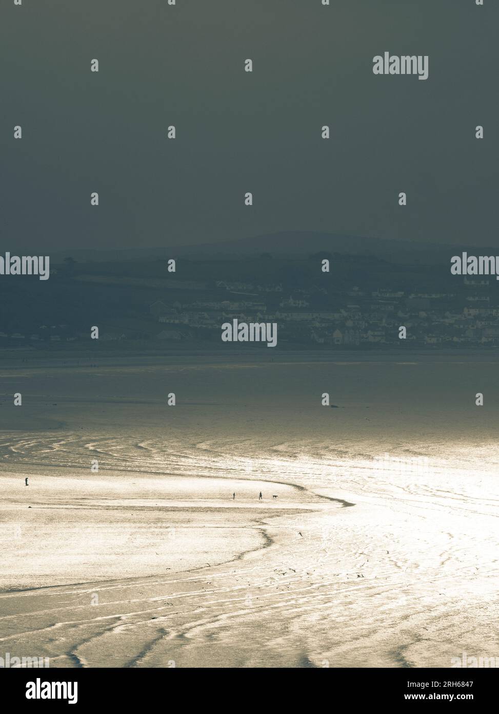 Dramatic Light and Walkers on Long Rock Beach, Penzance, Cornwall ...