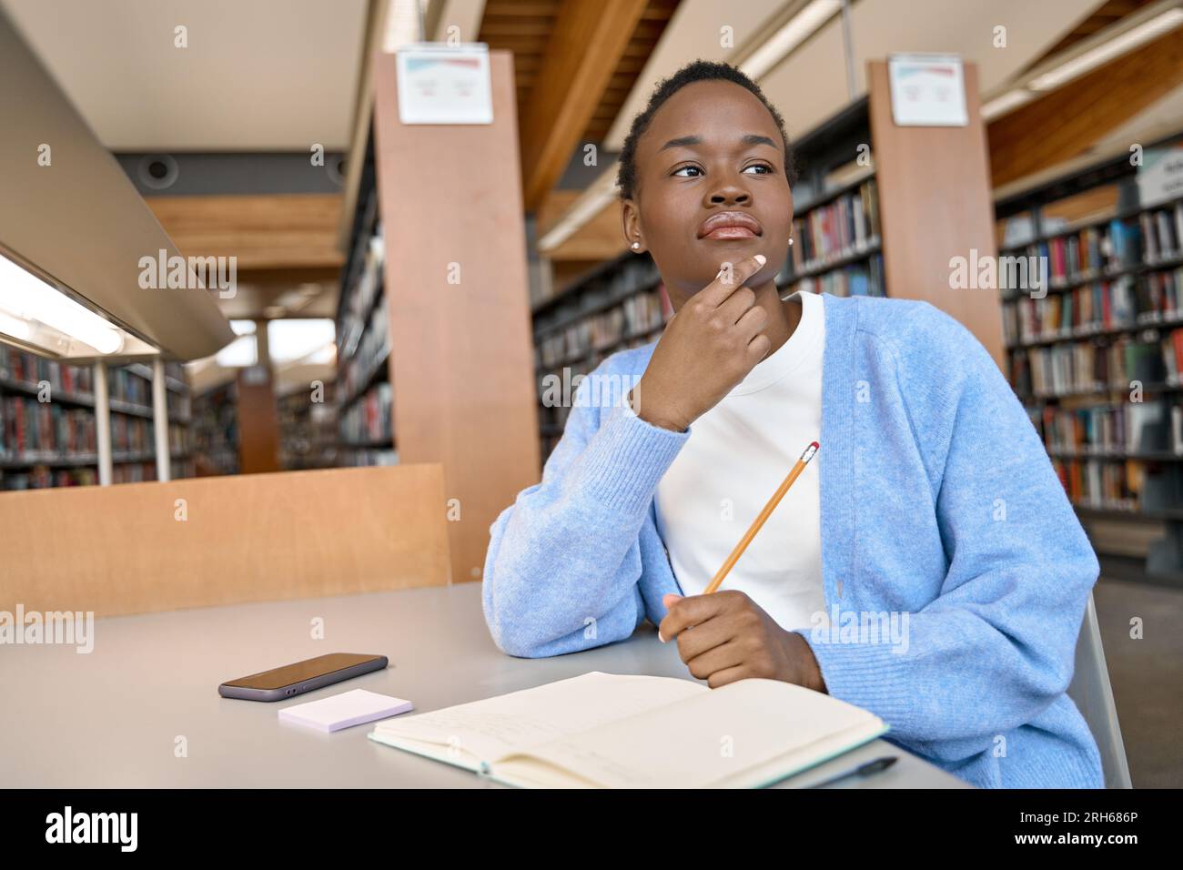 African girl thinking in classroom hi-res stock photography and images ...