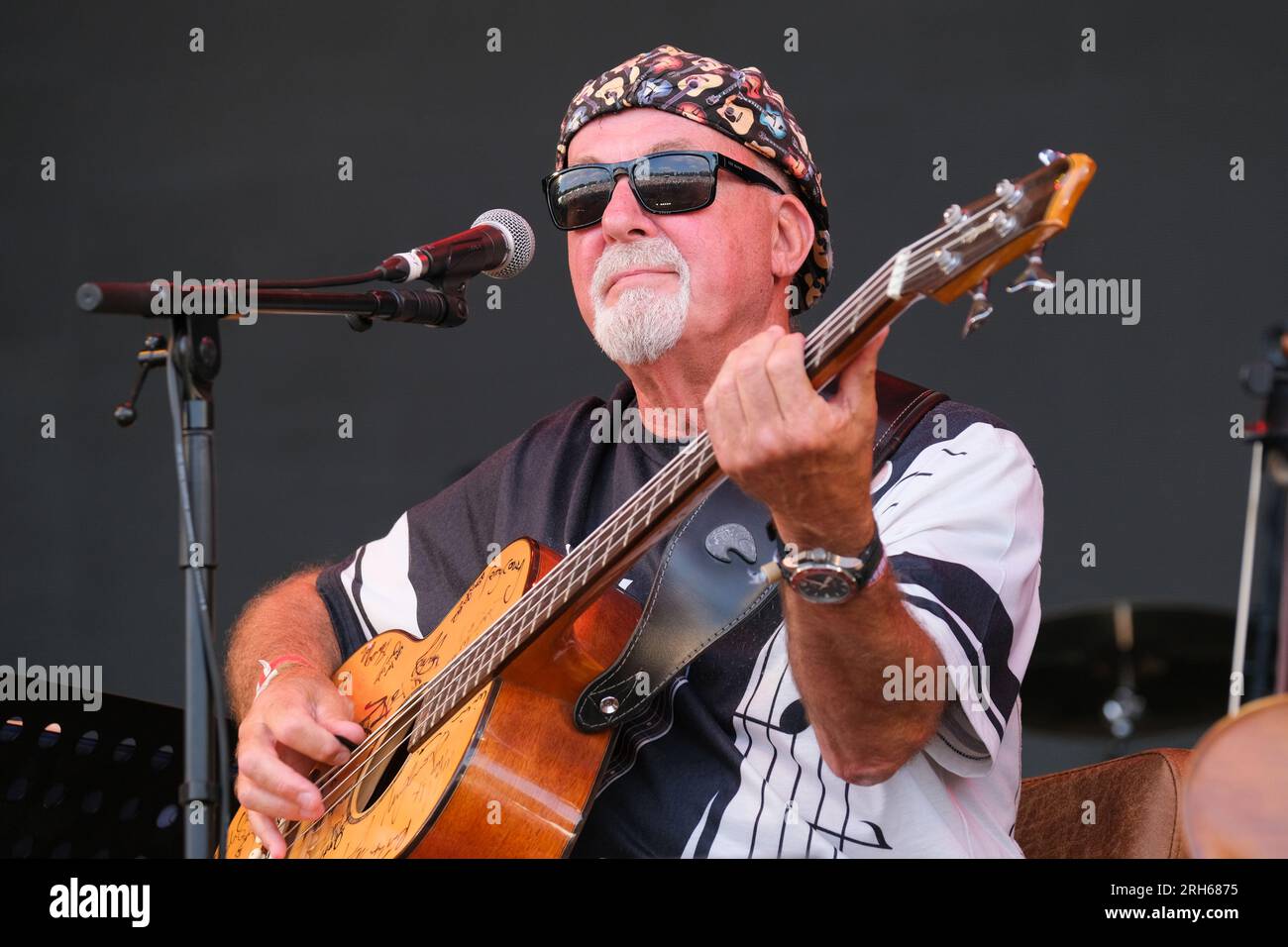 Dave Peggy Pegg of Fairport Convnetion performing at Fairports Cropredy ...