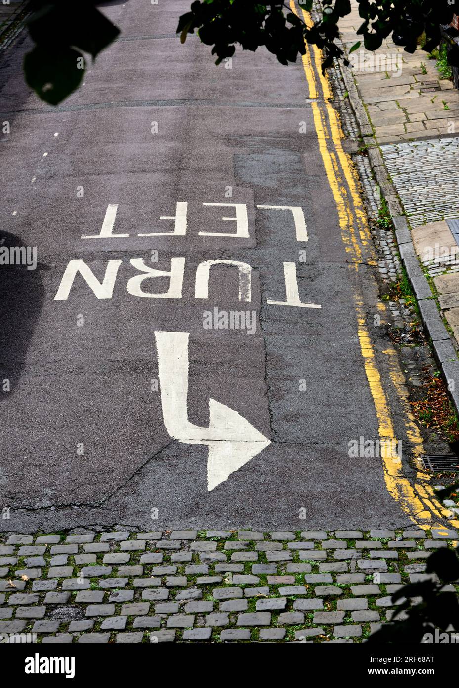 Left turn only road markings hi-res stock photography and images - Alamy
