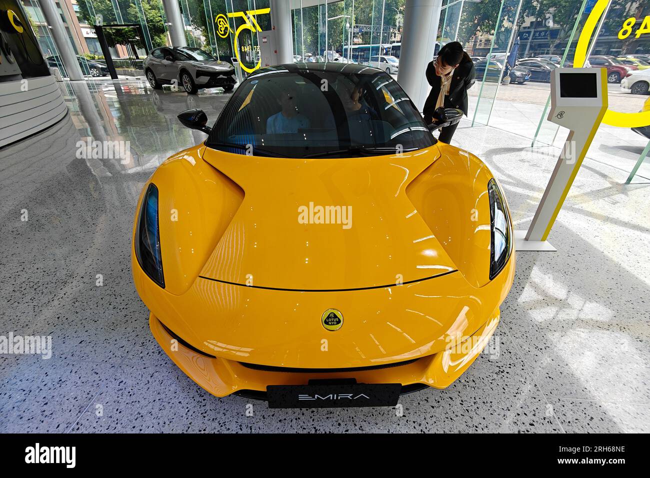 SHANGHAI, CHINA - AUGUST 14, 2023 - Customers shop for sports cars at ...