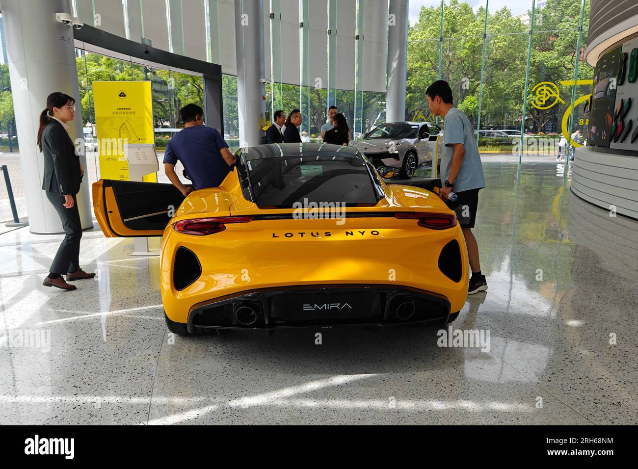 SHANGHAI, CHINA - AUGUST 14, 2023 - Customers shop for sports cars at ...