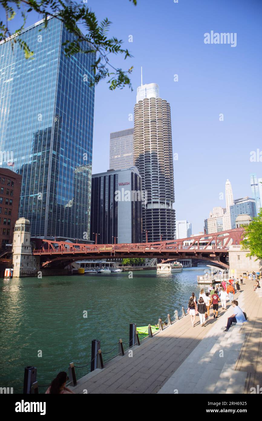 Clark street bridge and Chicago Riverwalk with the Marina City ...