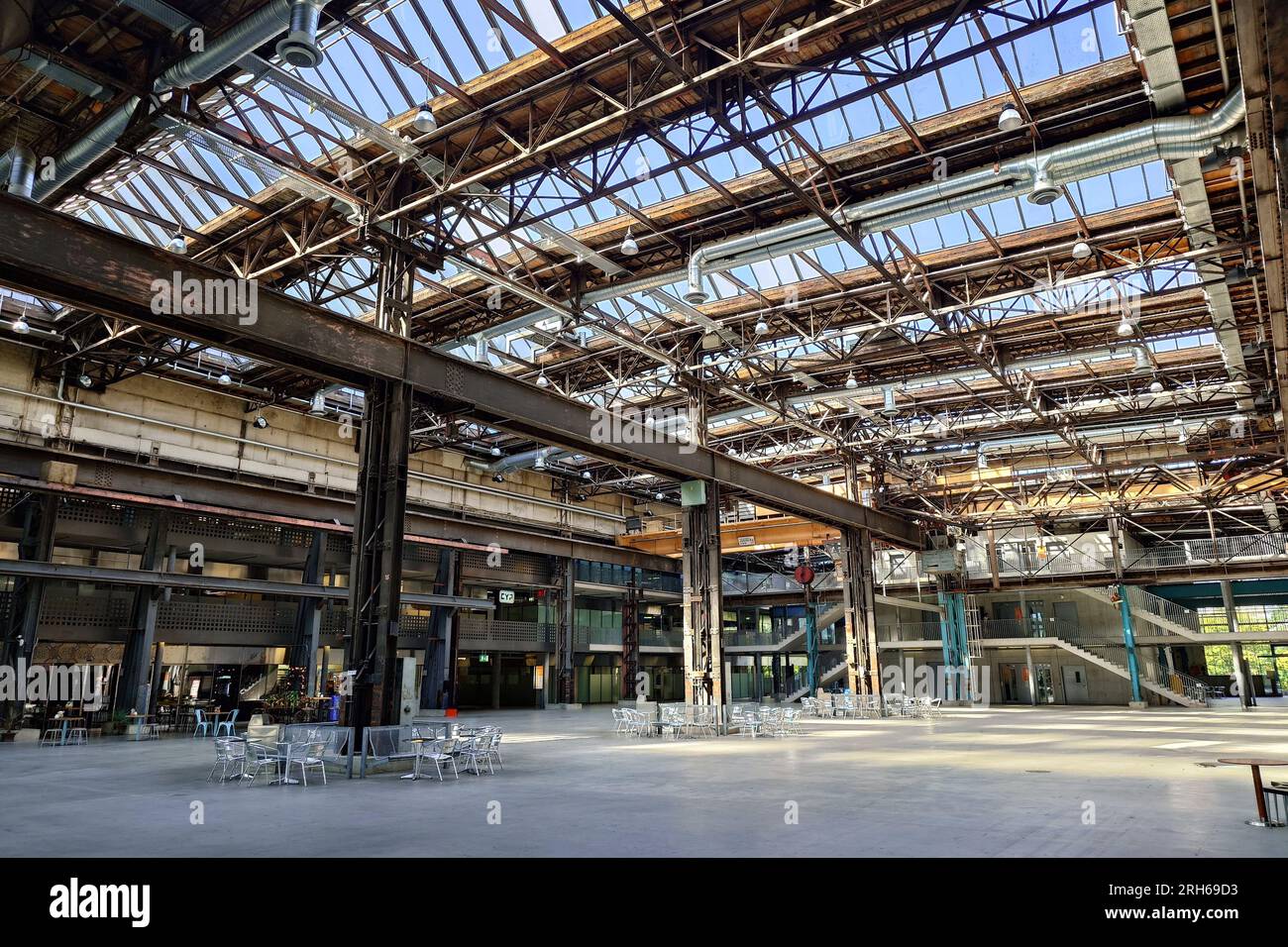 Large empty interior space of former heavy industry factory space ...