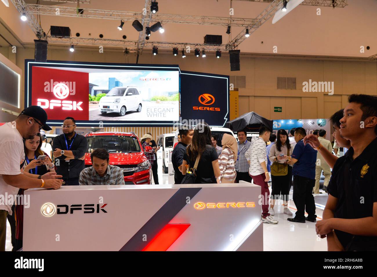Tangerang, Indonesia. 14th Aug, 2023. People visit the booth of DFSK at the GAIKINDO Indonesia ...
