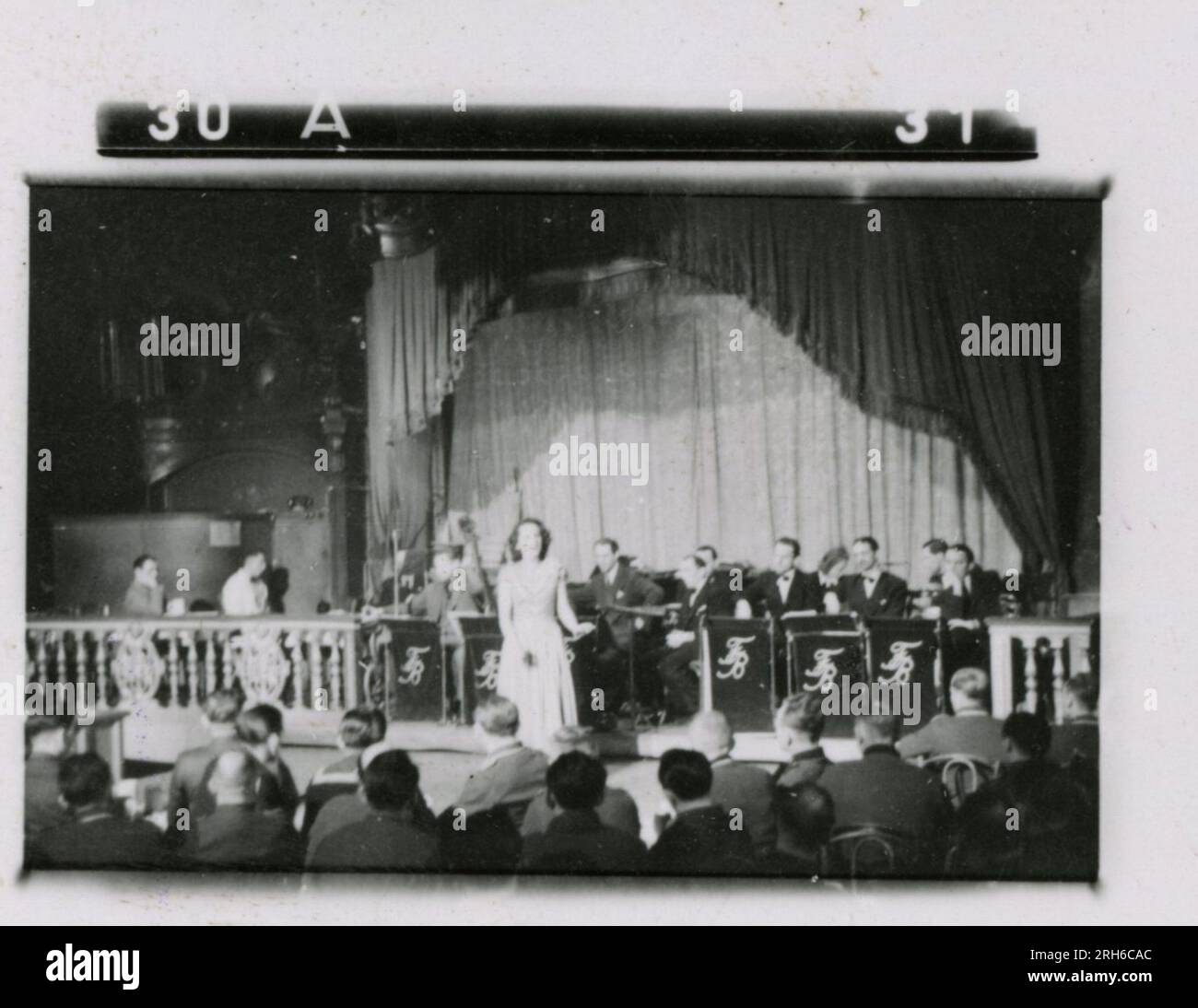 SS Photographer, Funk (1943) Concert hall with performers ...