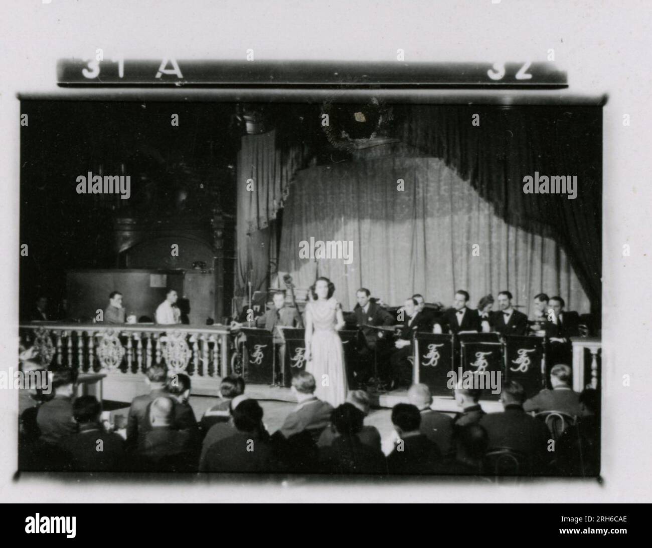 SS Photographer, Funk (1943) Concert hall with performers ...