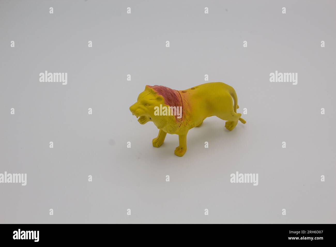 toy plastic lion and white background islote Stock Photo - Alamy