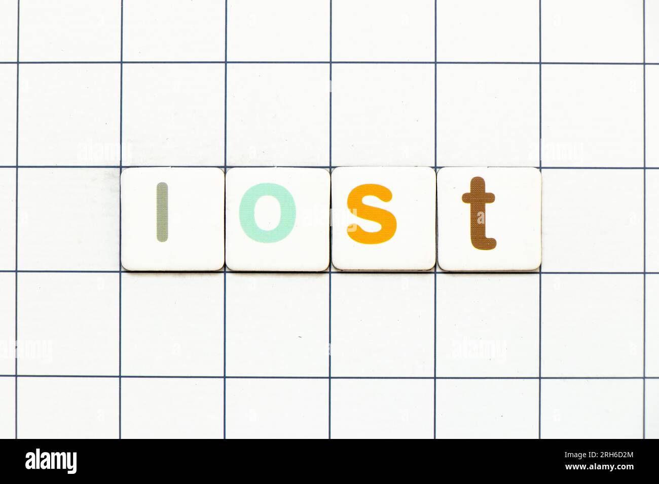 Colorful tile letter in word lost on white grid background Stock Photo ...