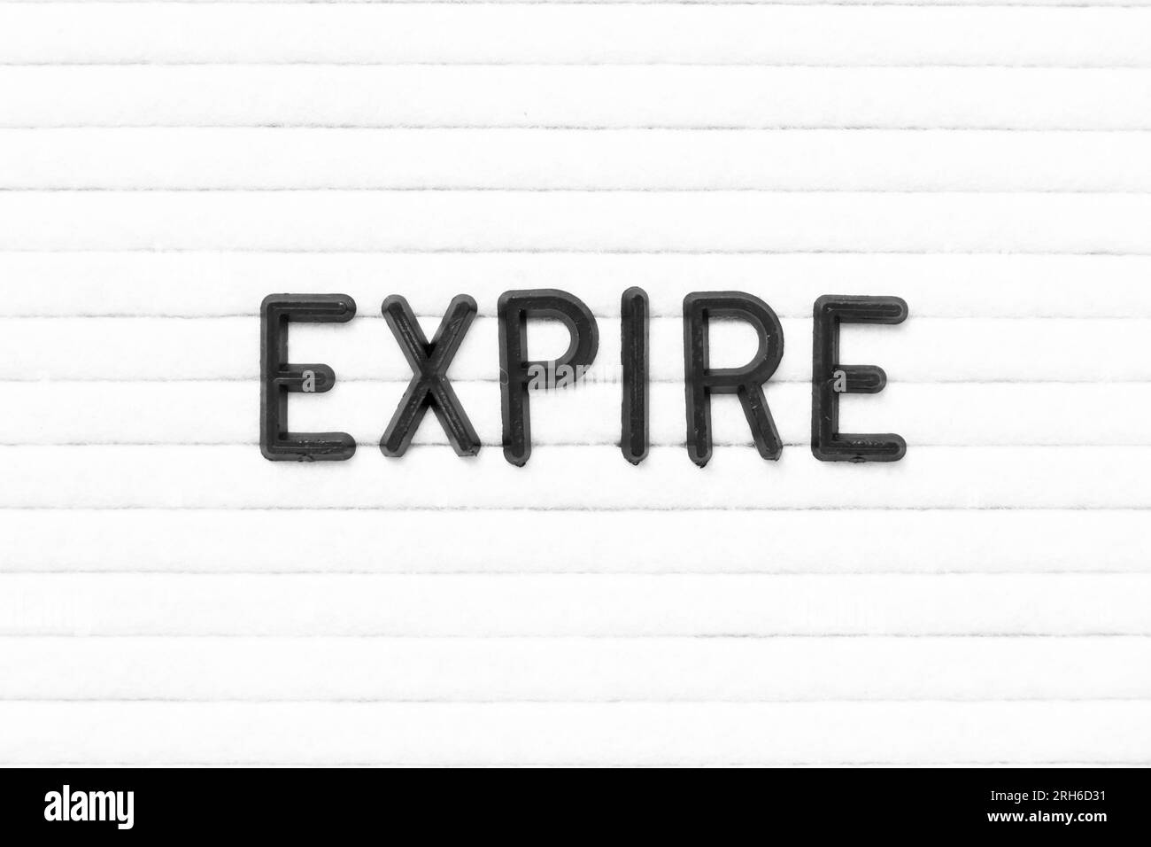 Black color letter in word expire on white felt board background Stock ...
