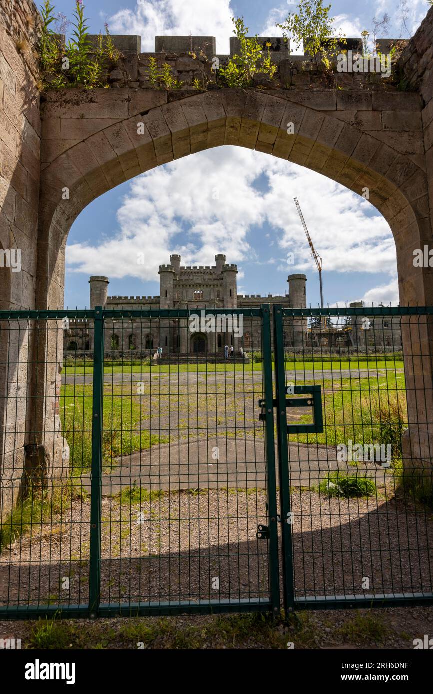 Security fence barricading an entrance to Lowther Castle. Westmorland ...
