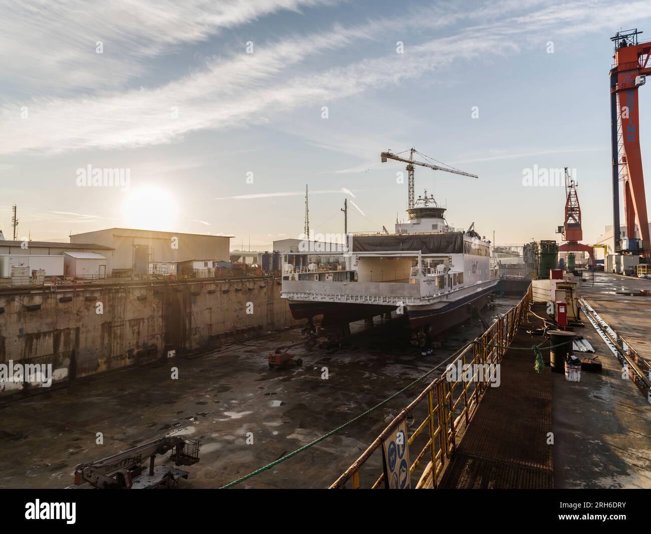 drone shot of a cargo ship in a docking station. import and export ...