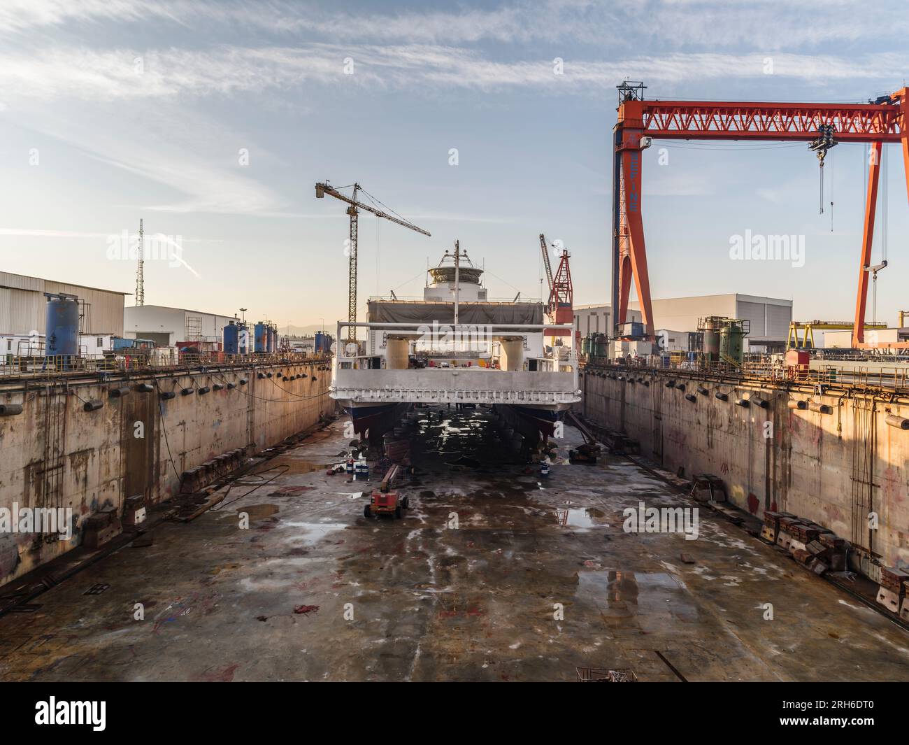 drone shot of a cargo ship in a docking station. import and export ...