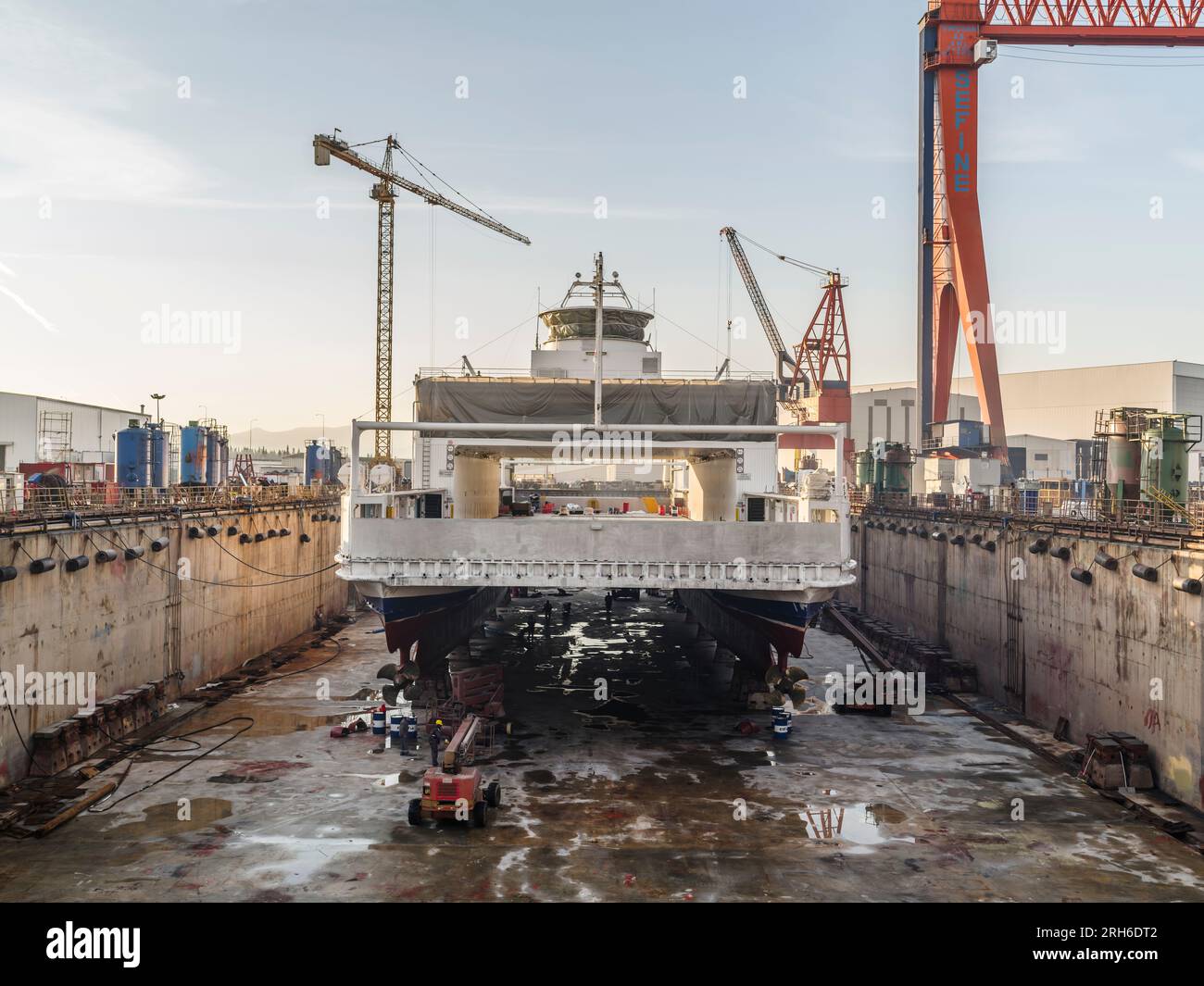 drone shot of a cargo ship in a docking station. import and export ...