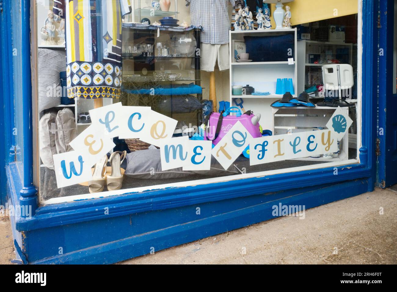 Welcome to Filey in a charity shop window Stock Photo - Alamy