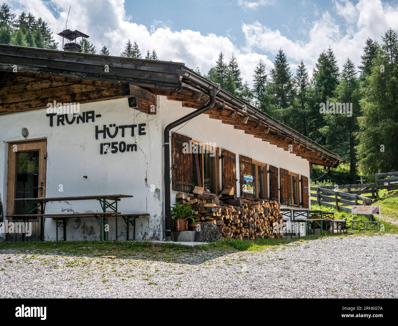 The image is of the privately owned Truner Hut mountain refuge located ...