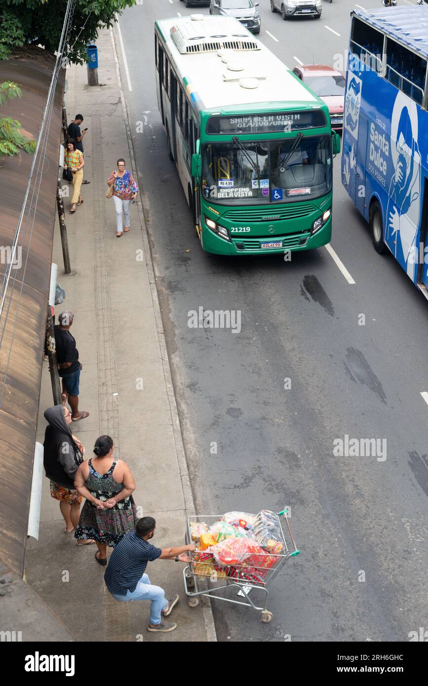Salvador, Bahia, Brazil - August 11, 2023: People are seen at the bus ...
