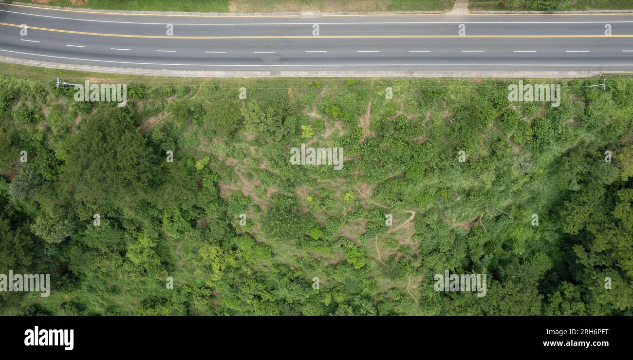 Empty highway road above view around green jungle background Stock ...