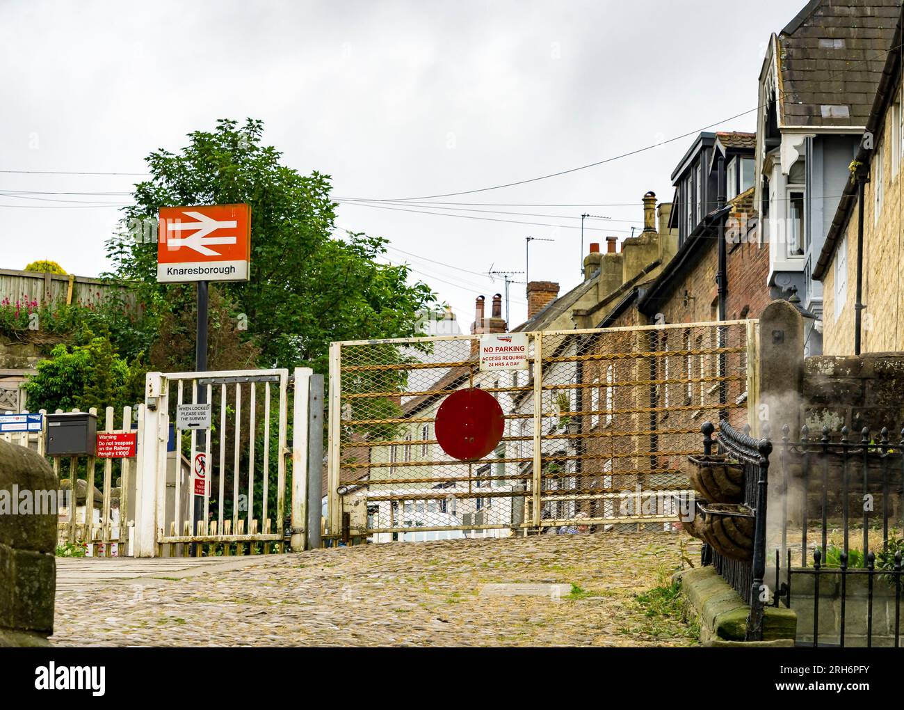 View up Station road to railway level crossing, Knaresborough, North ...