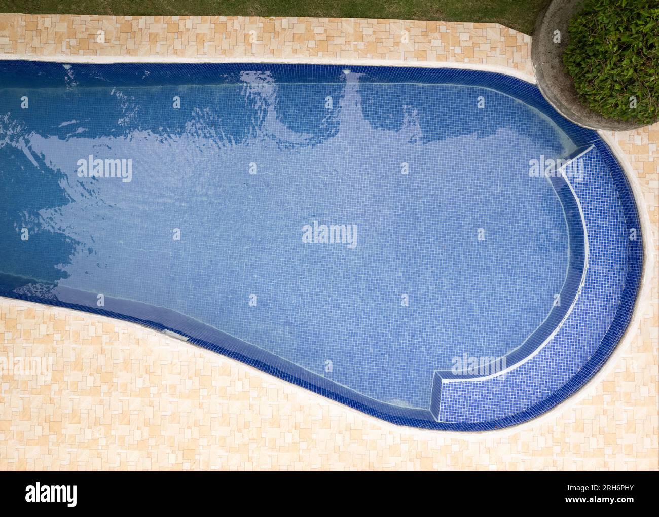 Home empty pool with blue tiles and step above top view Stock Photo - Alamy