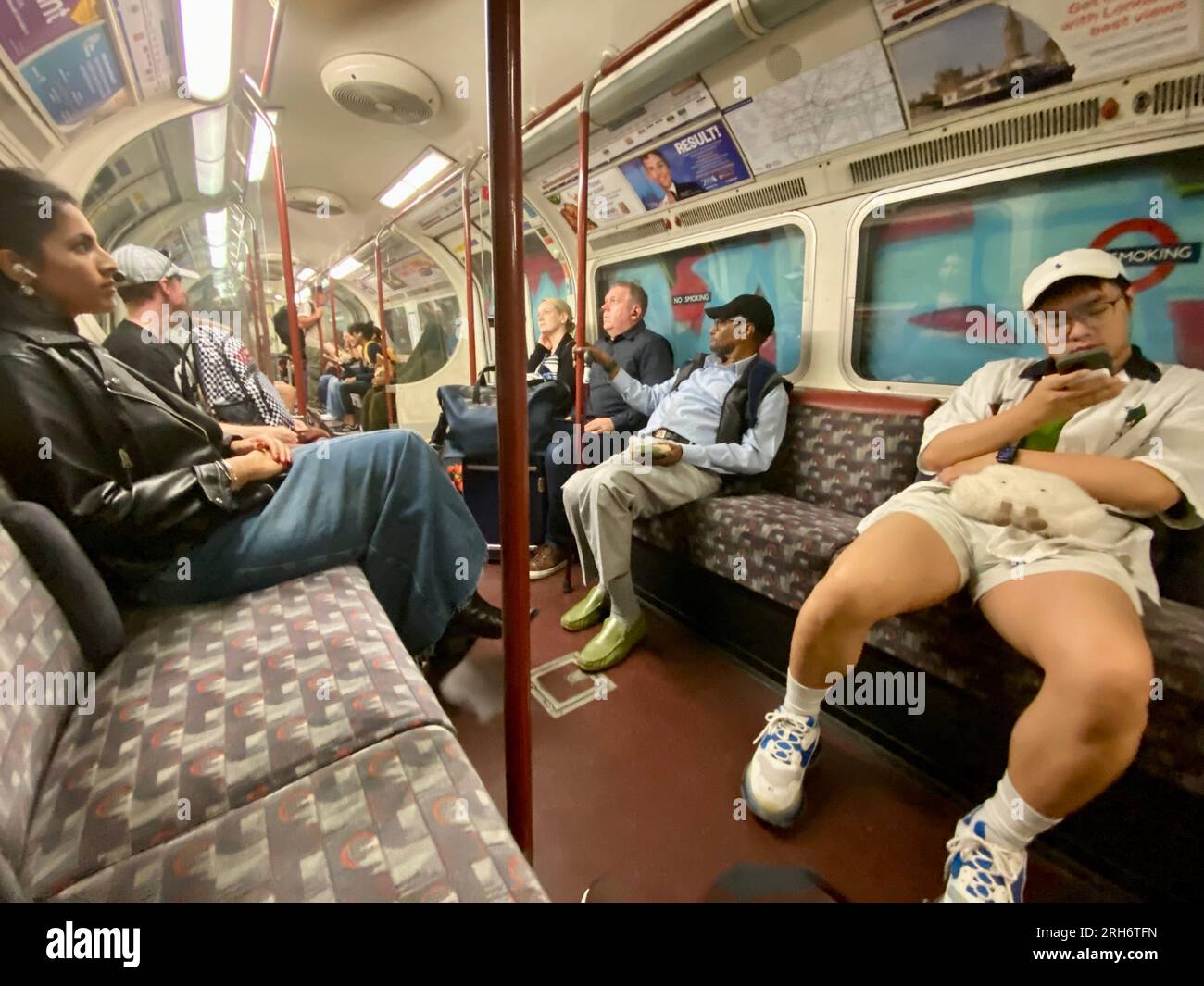 underground train with graffiti covering windows on the london ...