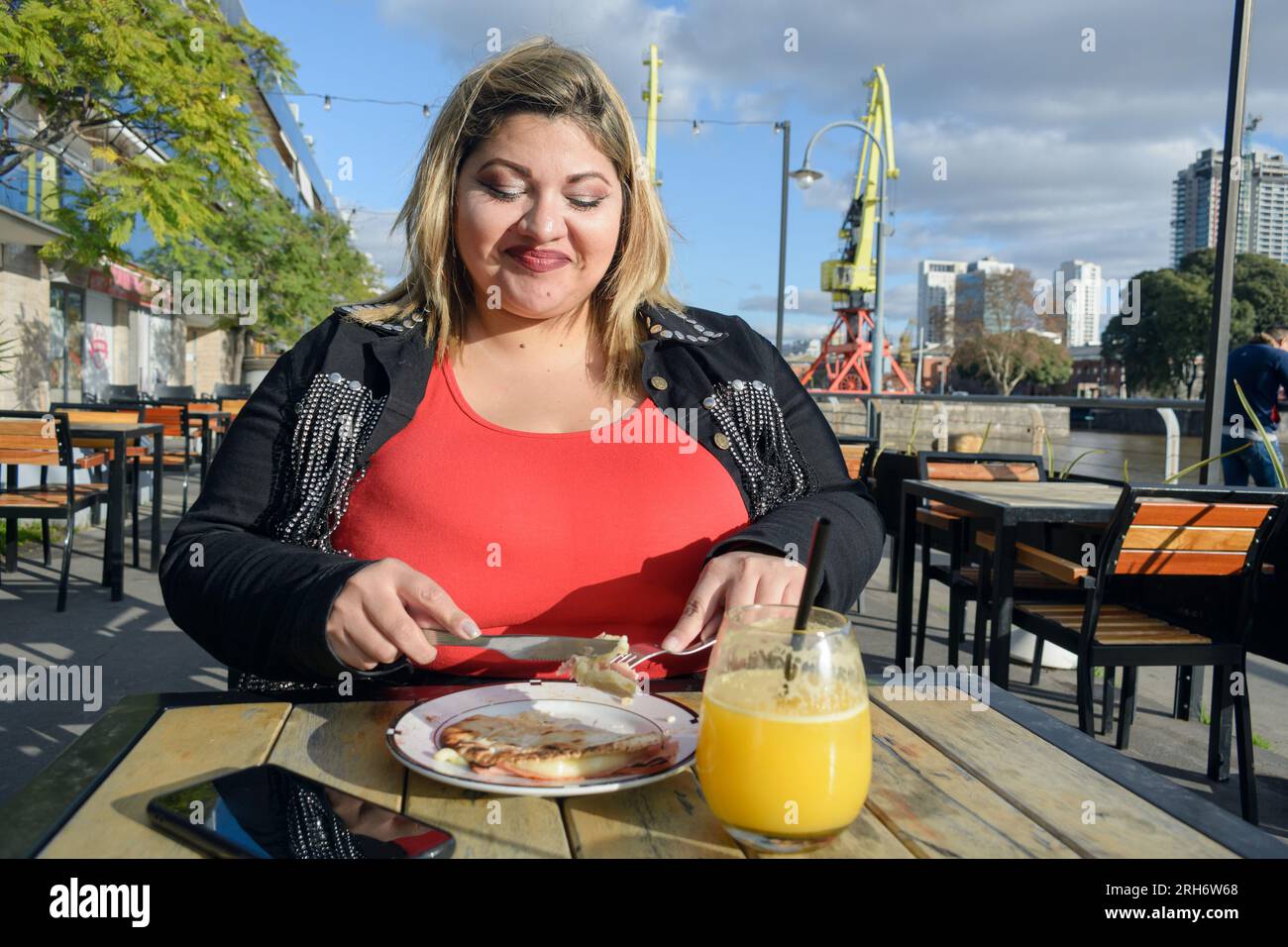 Ham eating woman hi-res stock photography and images - Alamy