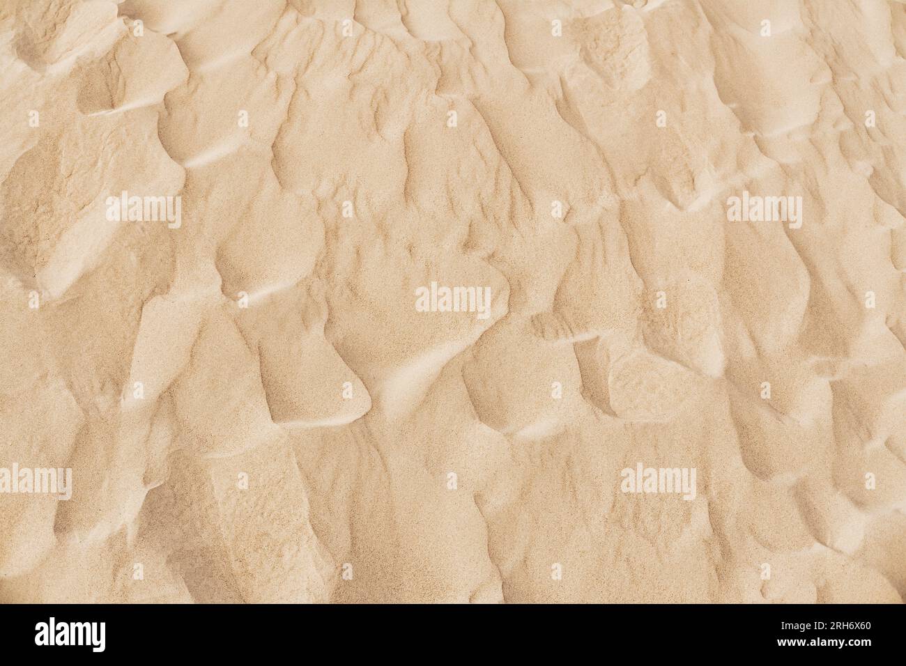 Natural sand texture. Yellow sand on the beach. Wavy sand background ...