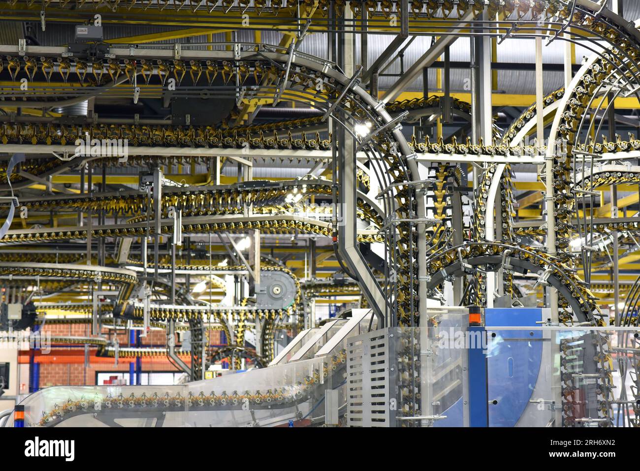 modern machines for transportation in a large print shop for production ...