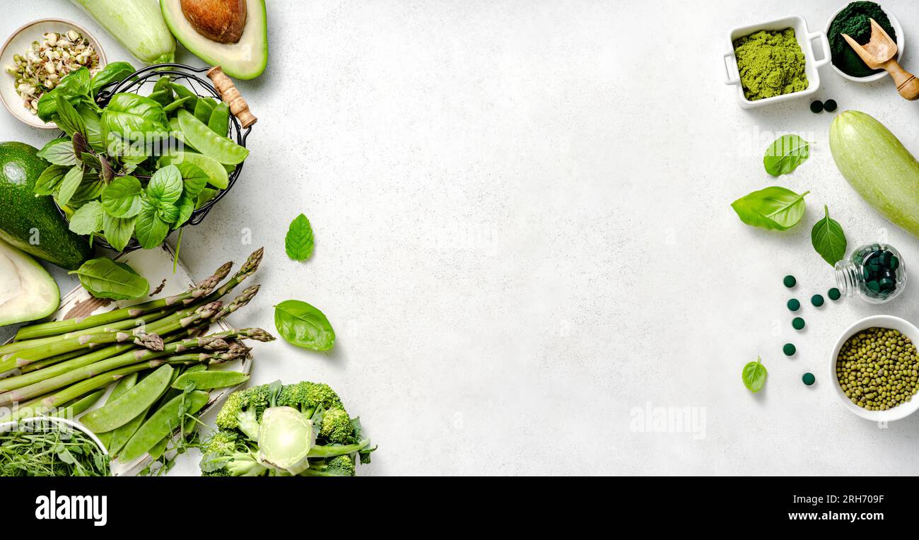 Vegetarian healthy green food on white background. Products for vegans ...