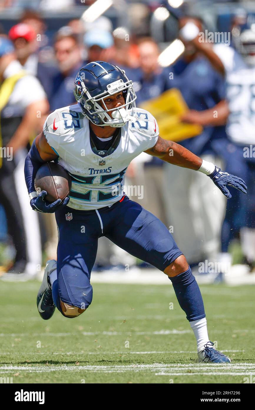 Tennessee Titans cornerback Tre Avery (23) runs with the ball after ...