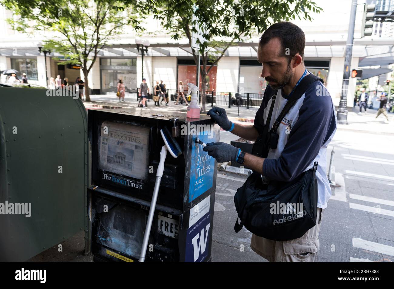 Seattle, USA. 5th July, 2023. A man cleaning graffiti in Westlake Stock ...
