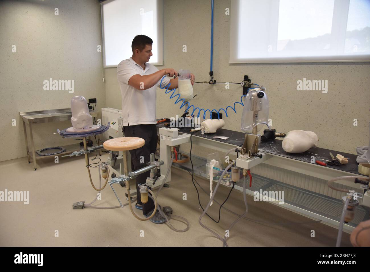 Lviv, Ukraine. 09th Aug, 2023. A doctor works in a prosthetic workshop ...