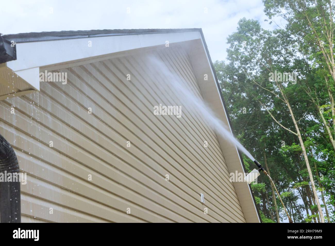 Washing siding houses becomes effortless for service worker as they ...