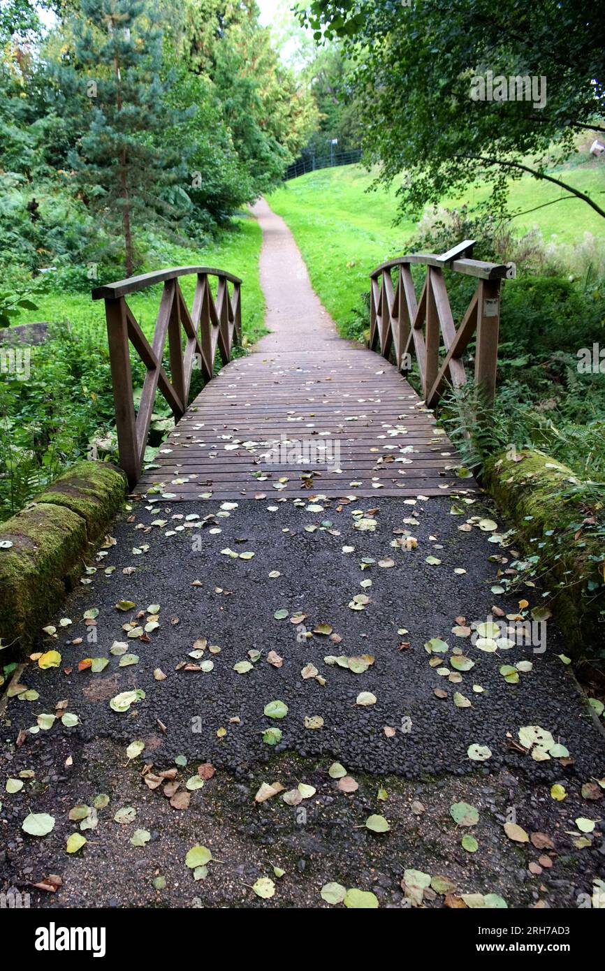 Over foot bridge in Witley Court garden. Leaves on dhe ground Stock ...
