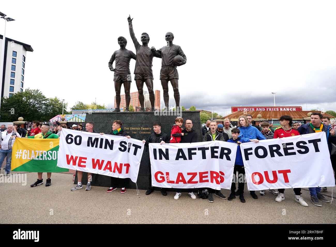 Manchester United fans protest outside the stadium before the Premier ...