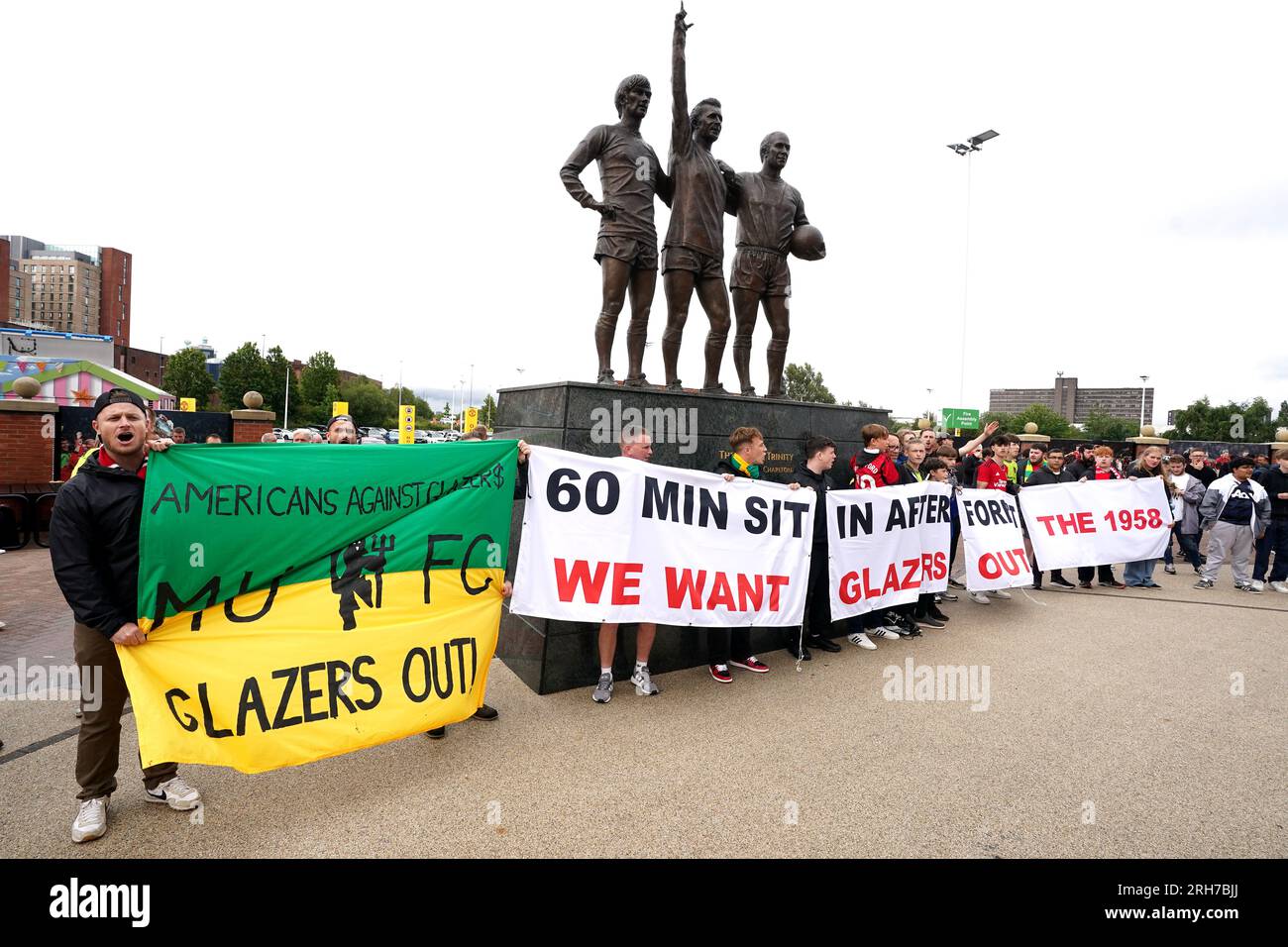 Manchester United fans protest outside the stadium before the Premier ...