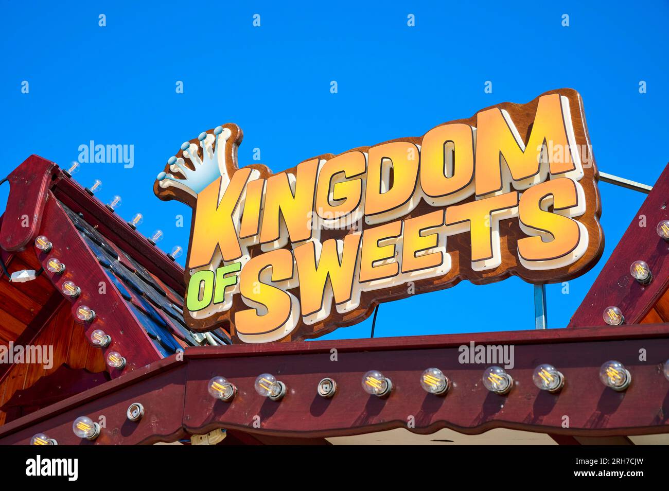 Kingdom of sweets sign above kiosk in Blackpool Stock Photo - Alamy