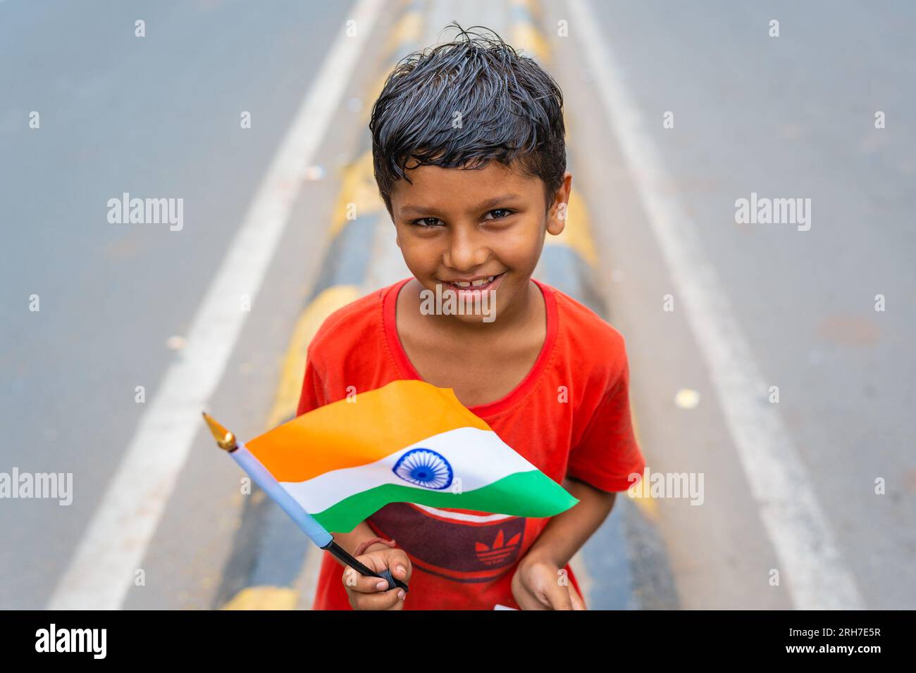 Ahmedabad, Gujarat, India. 14th Aug, 2023. Street kids are selling ...