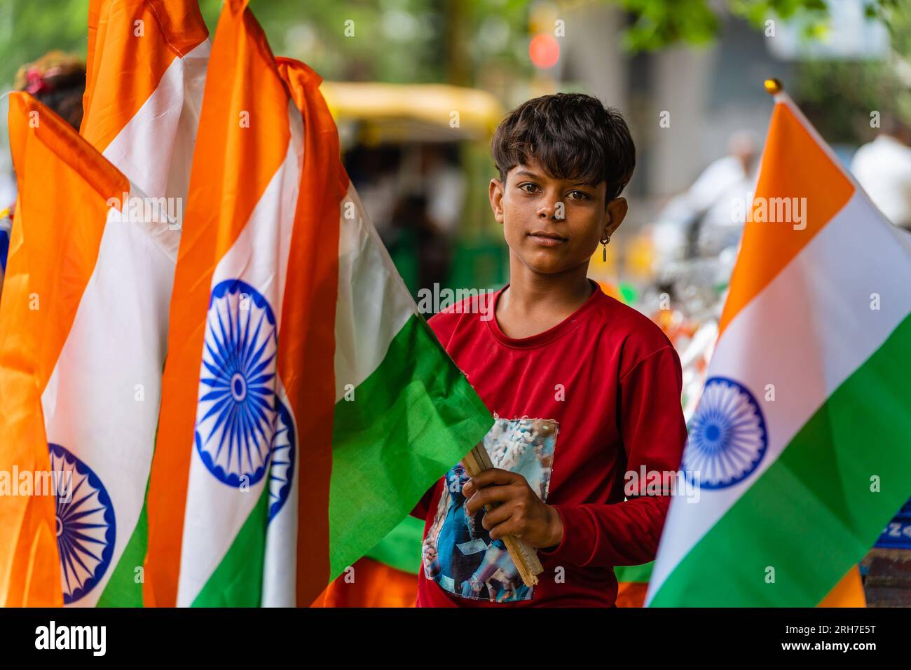 Ahmedabad, Gujarat, India. 14th Aug, 2023. Street kids are selling ...