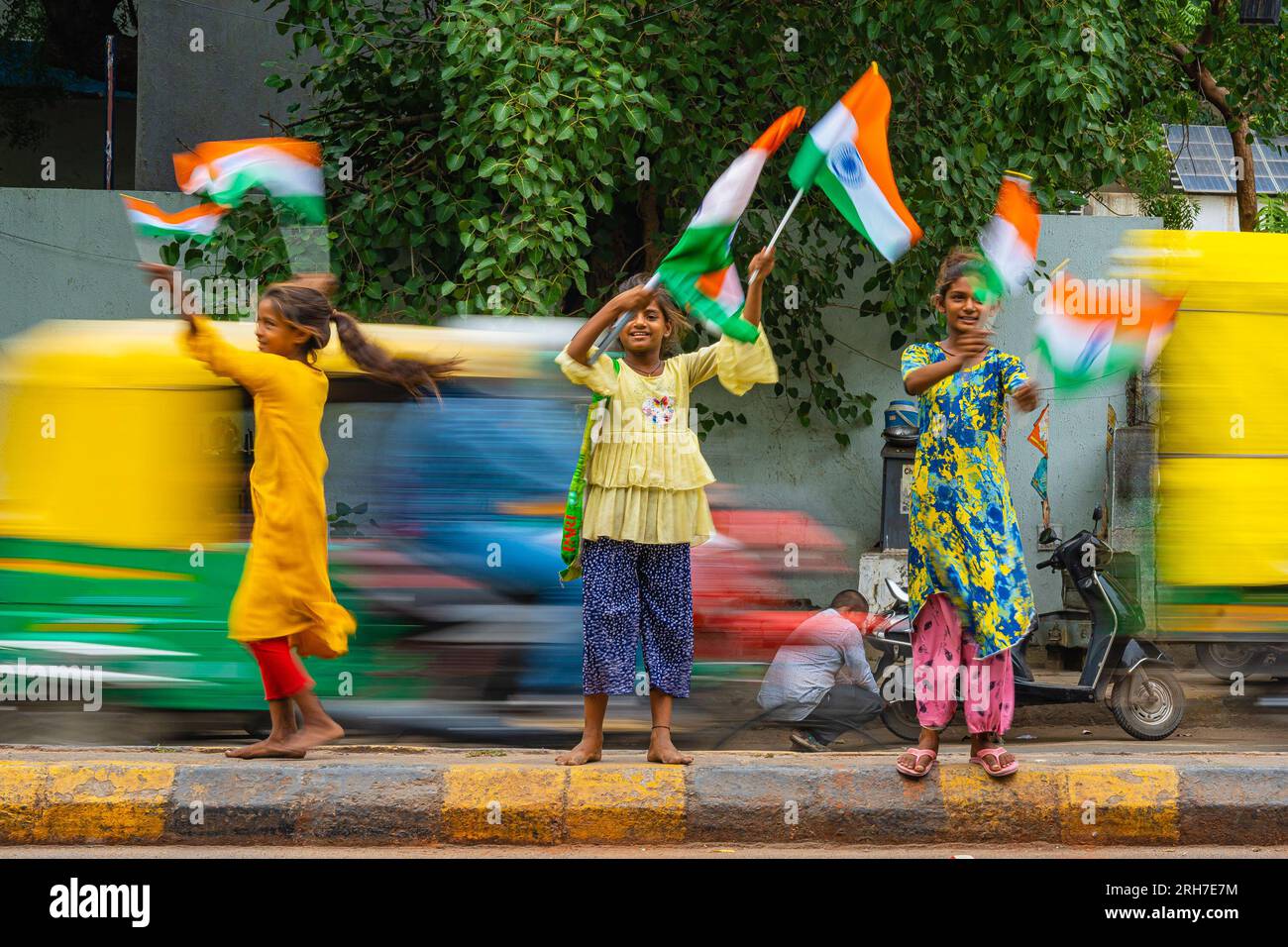 Ahmedabad, Gujarat, India. 14th Aug, 2023. Street kids are selling ...