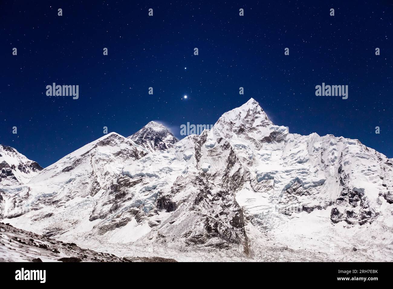 Mount Everest under bright stars. Everest base camp on clear starry ...
