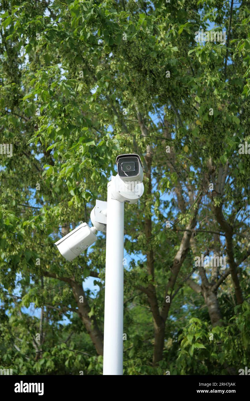 CCTV security camera operating outdoor Stock Photo - Alamy