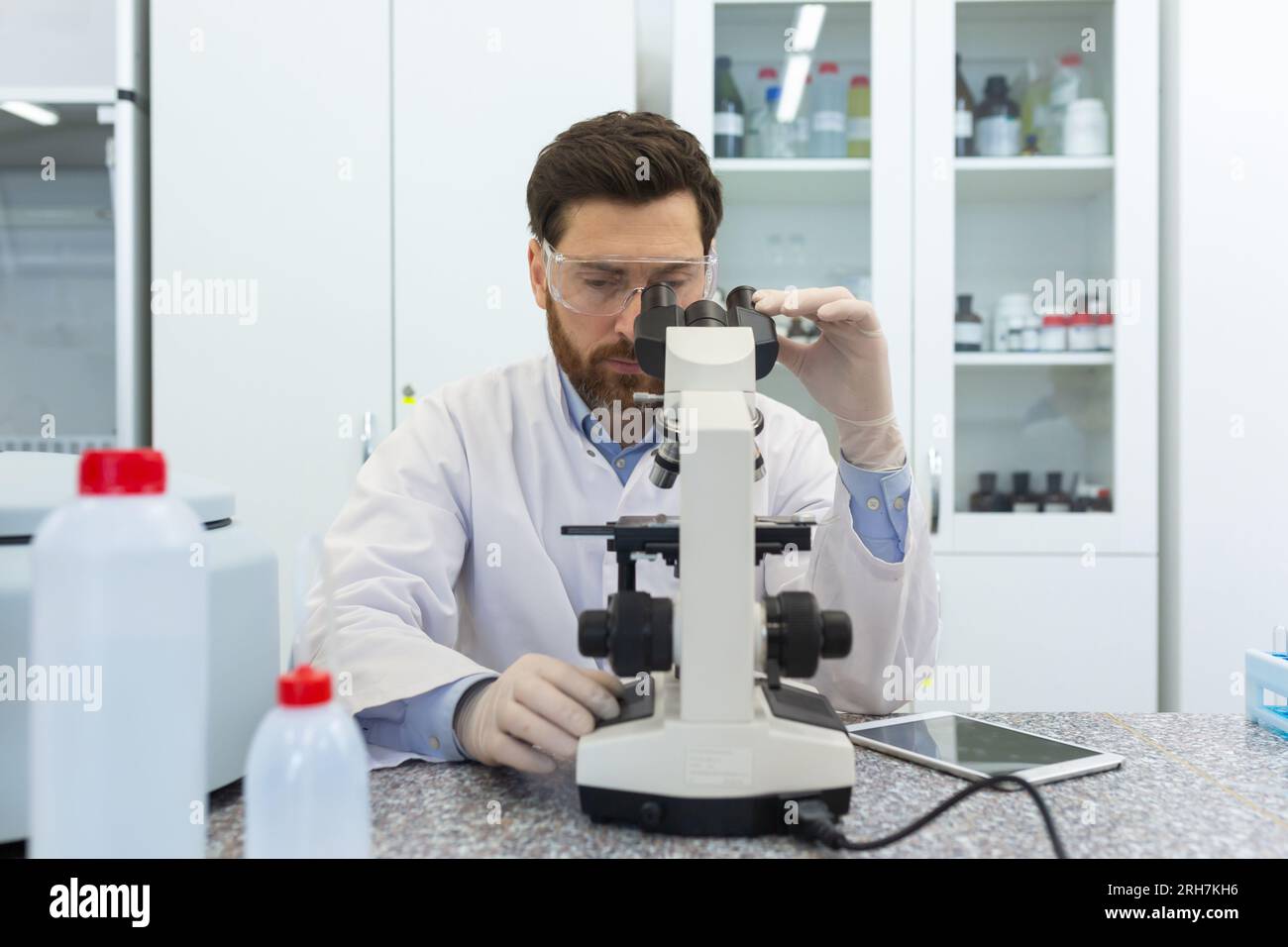 Serious scientist looks test hi-res stock photography and images - Alamy