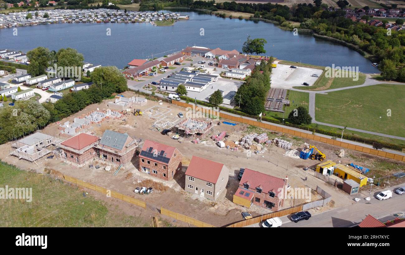 Aerial view from height by drone of beautiful new quality houses being ...