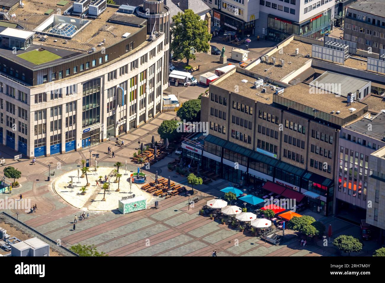 Aerial view, outdoor restaurant with sand place at Kennedyplatz, city ...