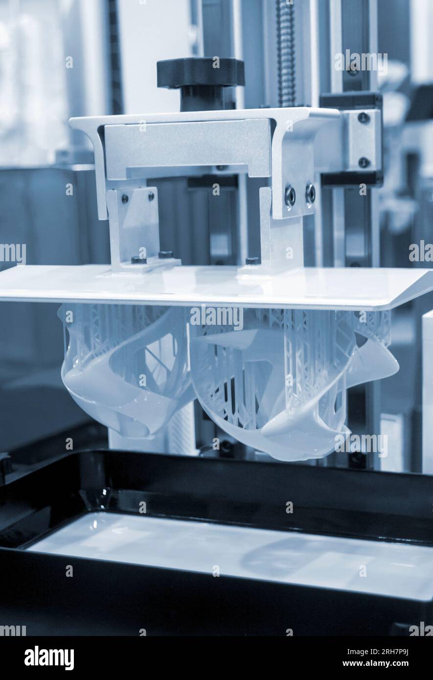 Printed models on 3D printer close-up. Objects printed on photopolymer ...