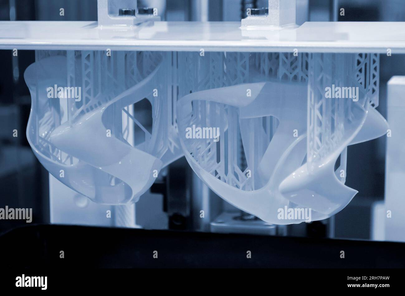 Printed models on 3D printer close-up. Objects printed on photopolymer ...