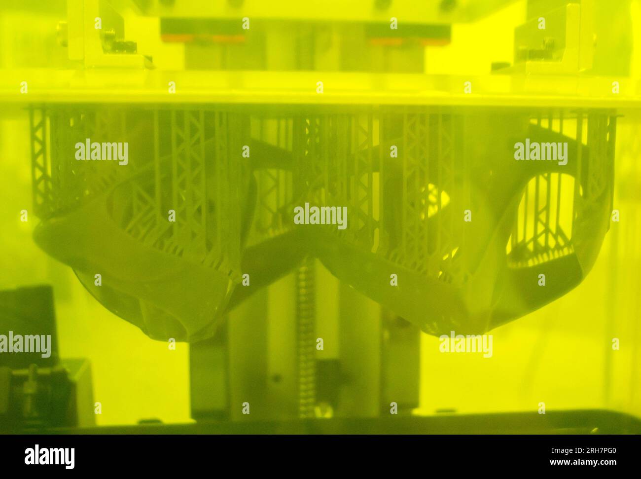 Printed models on 3D printer close-up. Objects printed on photopolymer ...