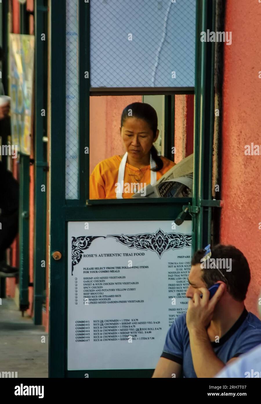 Asina restaurant carry out window Stock Photo - Alamy