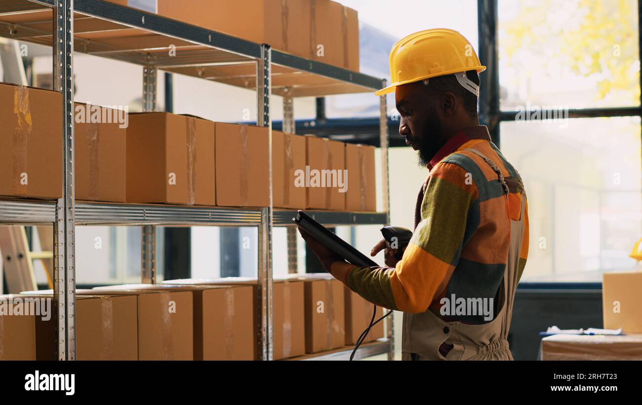 African american worker planning products hi-res stock photography and ...
